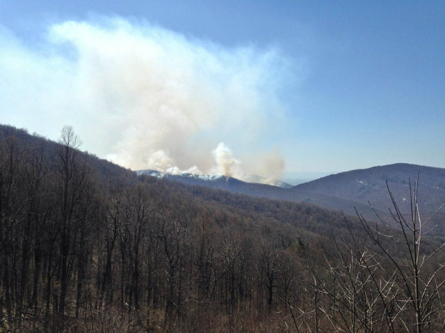 Through Windy Conditions, Fire Crews Are Working To Contain The Rocky ...