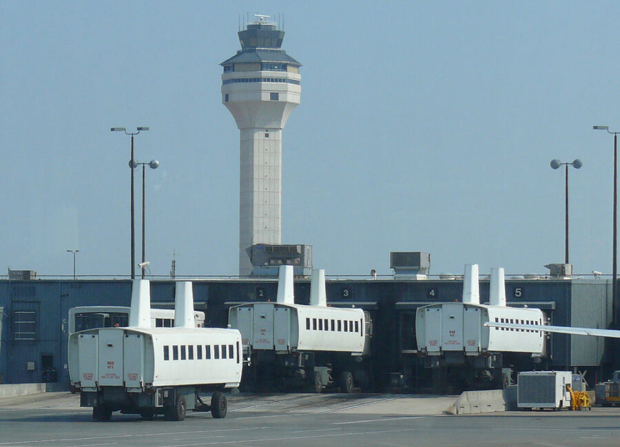 A mobile lounge carrying dozens of passengers struck a gate at Dulles ...